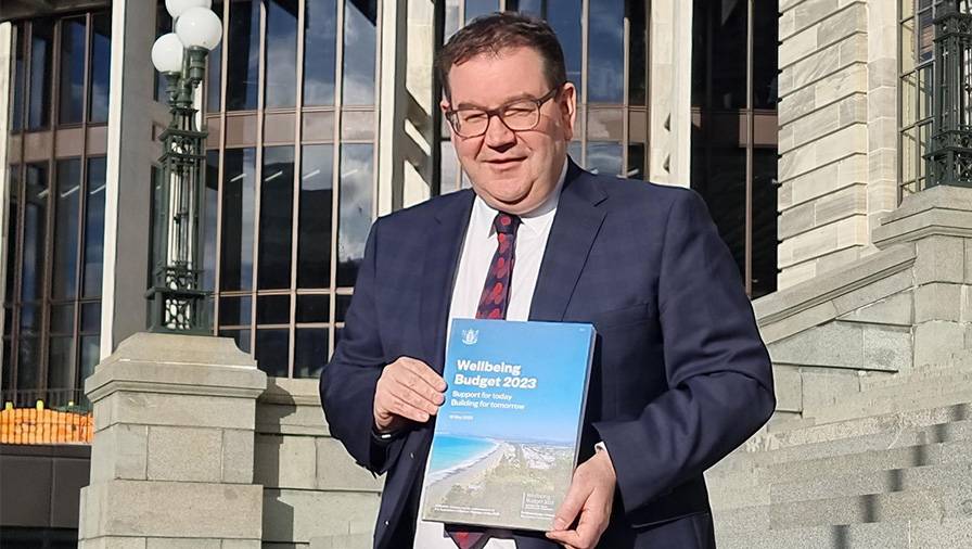 Finance Minister blames cyclone for delay getting into surplus