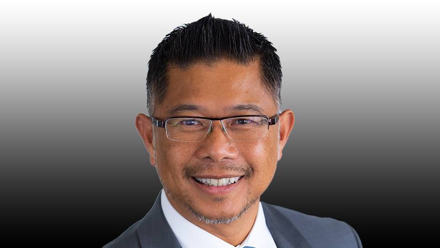 From 13-year-old refugee to software group director