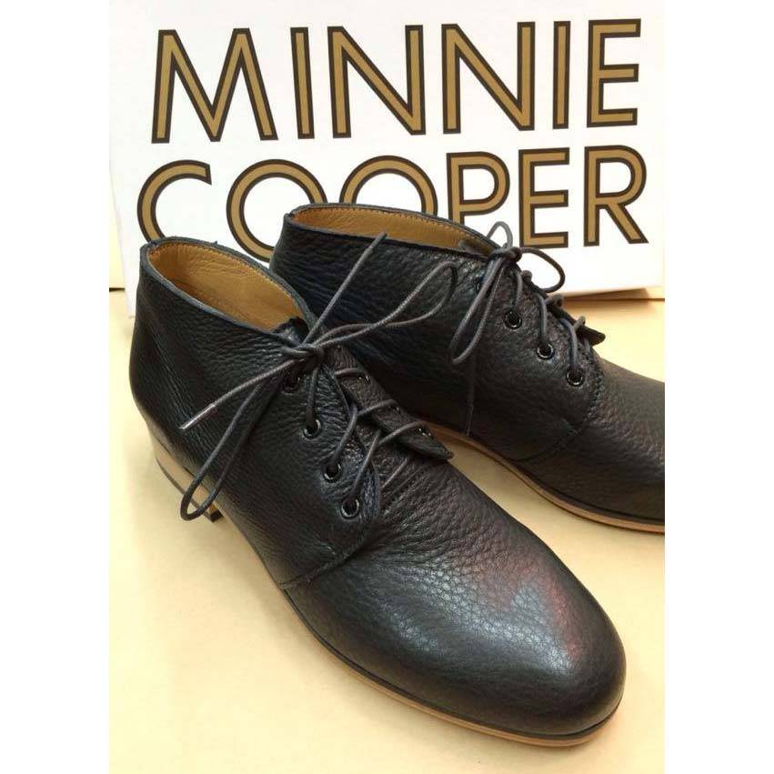Minnie Cooper plans to close stores, move online